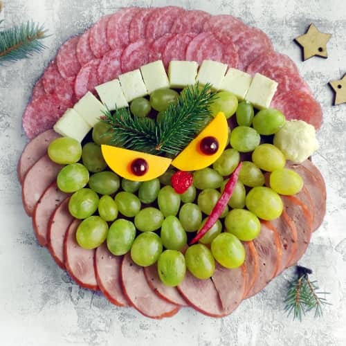 Fun Grinch Charcuterie Board For Kids | Rediscovered Families